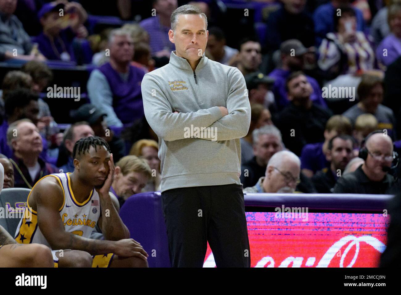 LSU head coach Matt McMahon, right, and guard Trae Hannibal, left ...