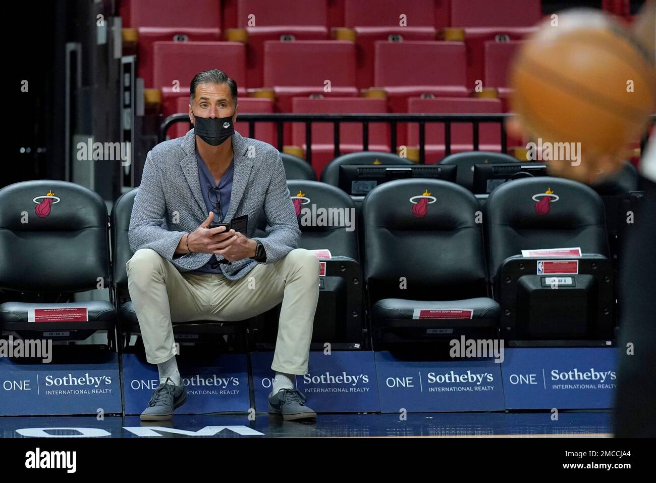 Los Angeles Lakers General Manager Rob Pelinka watches players warm up ...