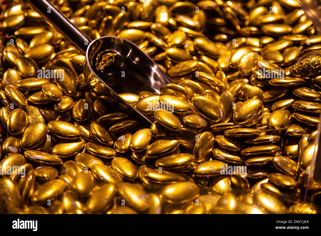 Gold chocolate dragees Stock Photo - Alamy