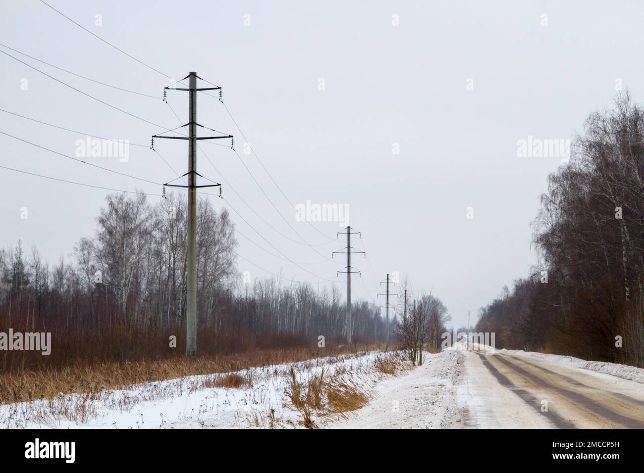 New large mast of an air power line close up, high voltage electricity ...