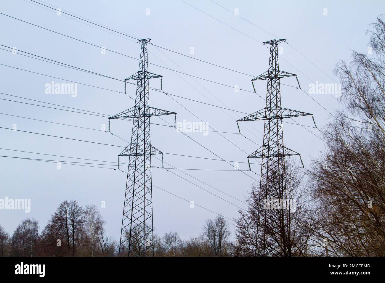New large mast of an air power line close up, high voltage electricity ...