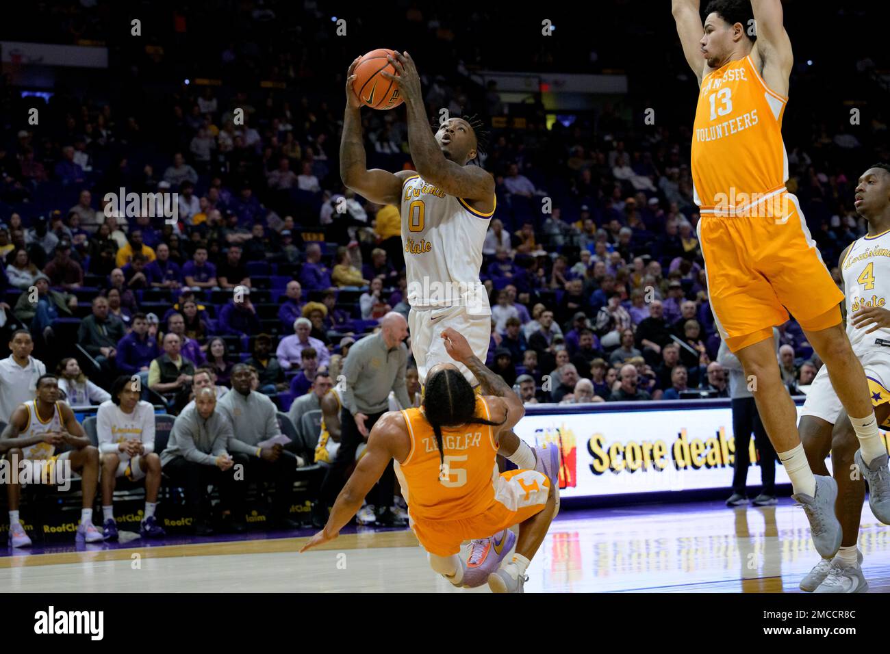 LSU guard Trae Hannibal (0) shoots against Tennessee guard Zakai ...