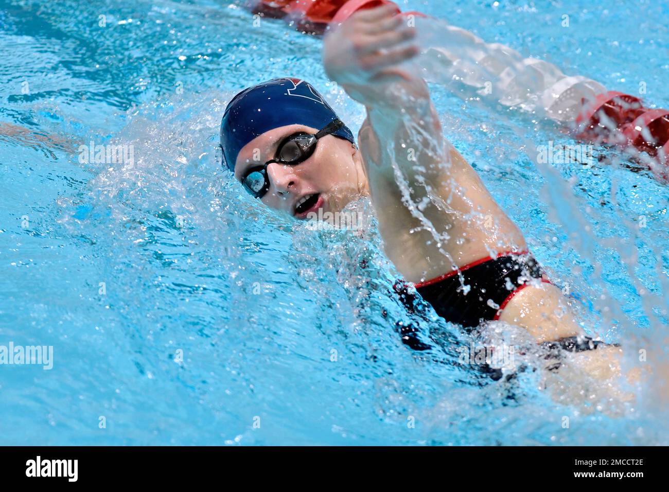 Transgender swimmer Lia Thomas, right during a meet with Harvard on ...