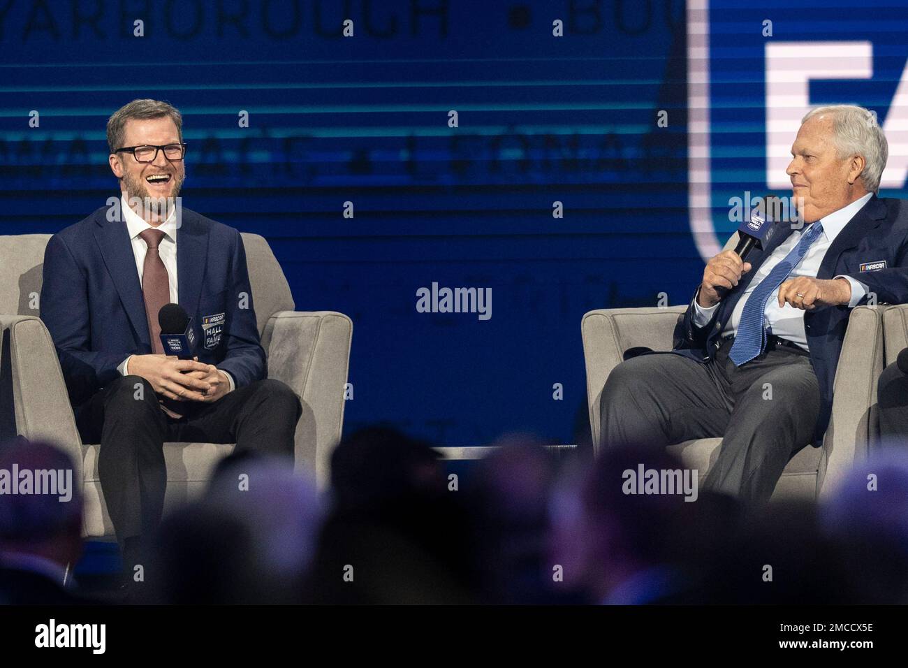 NASCAR Hall of Fame inductee Dale Earnhardt Jr., left, and Rick ...