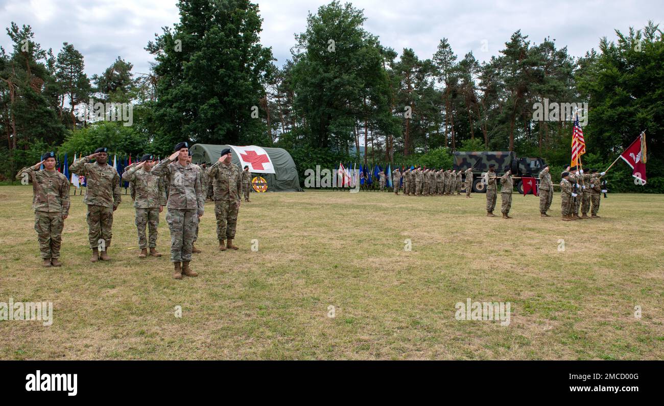 U.S. Soldiers with the 512th Field Hospital render honors during a ...
