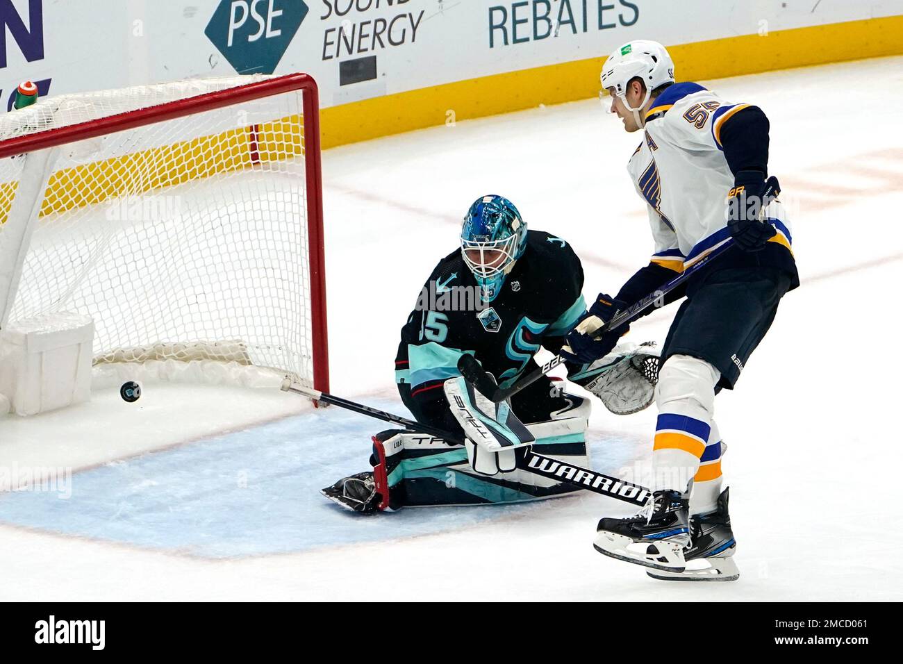St. Louis Blues' Colton Parayko, right, scores against Seattle Kraken ...