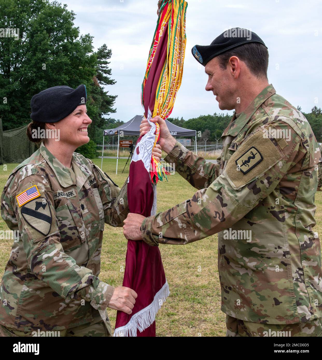 U.S. Army Lt. Col. Julie A. Hundertmark (left), outgoing 512th Field ...
