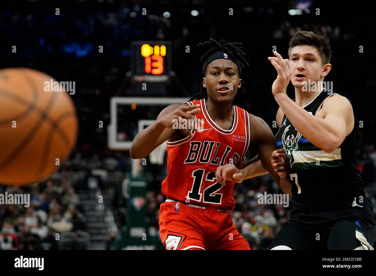 Chicago Bulls' Ayo Dosunmu and Milwaukee Bucks' Grayson Allen go after ...