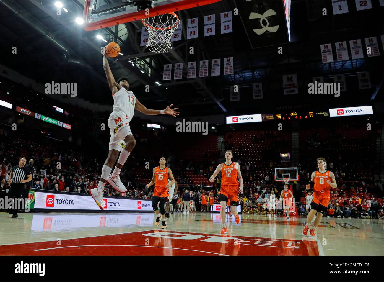 Maryland guard Hakim Hart (13) goes up for a dunk against Illinois ...