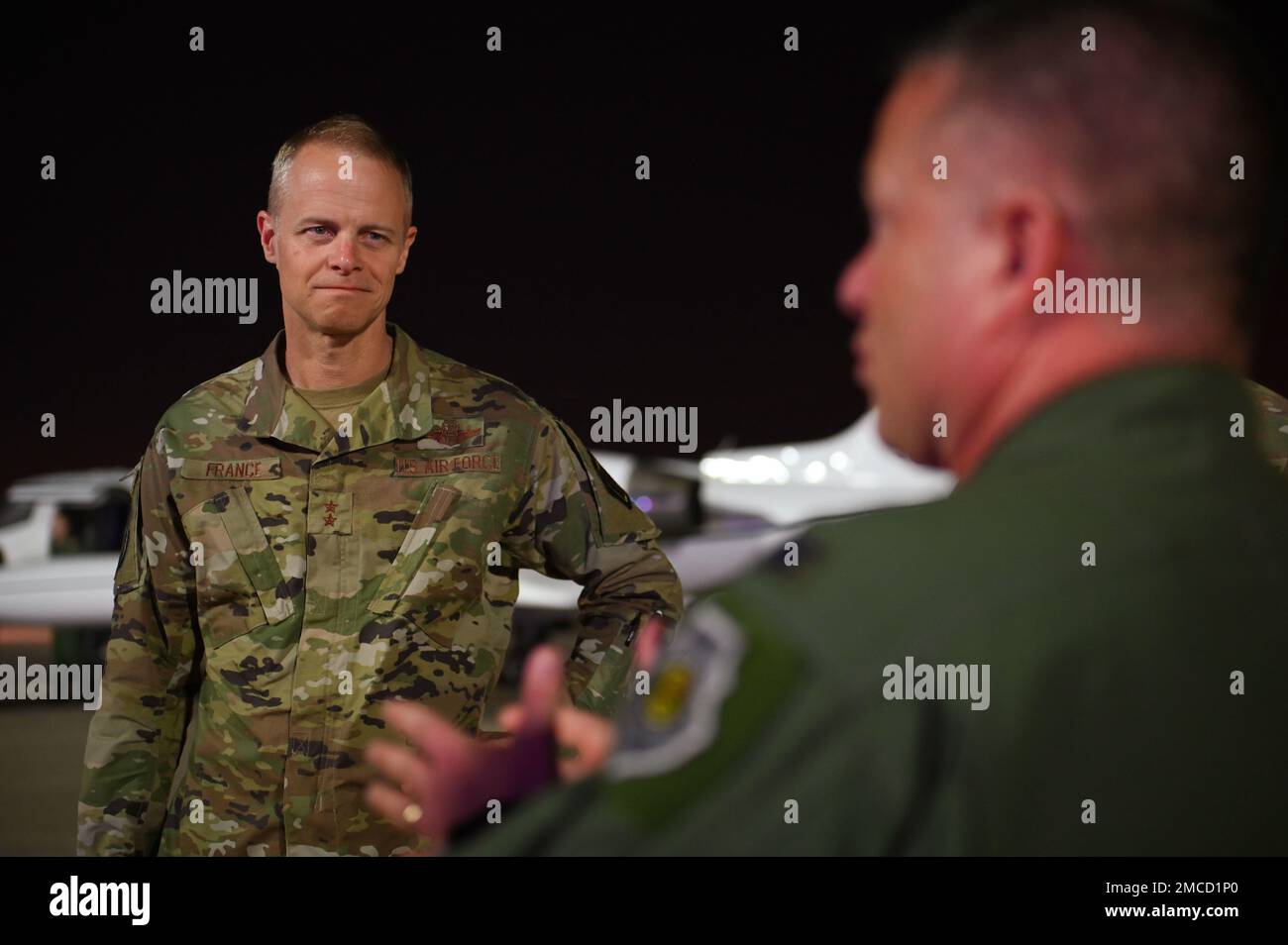 Maj. Gen. Derek France (left), Third Air Force commander, speaks with ...