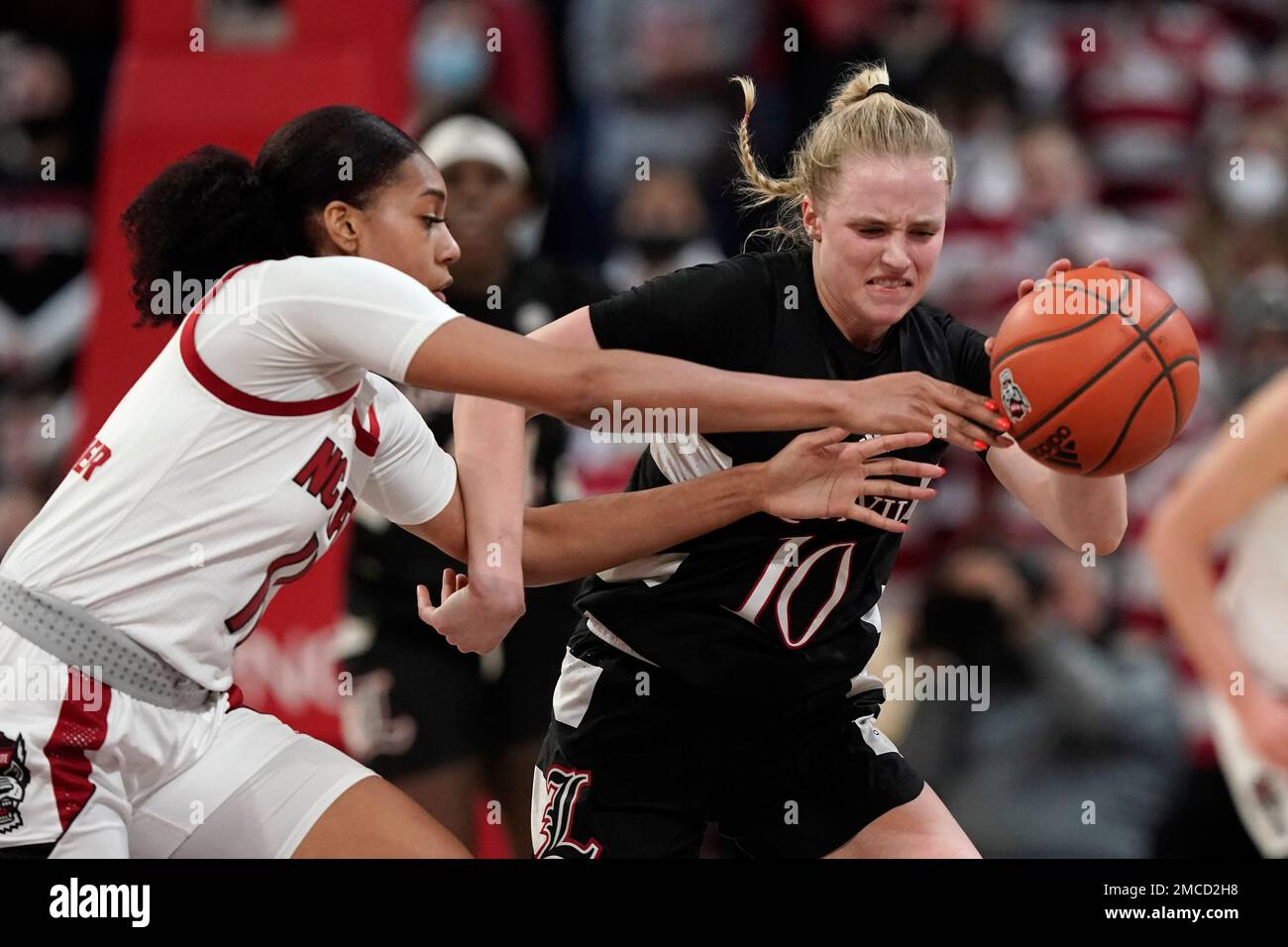 North Carolina State forward Jakia Brown-Turner (11) reaches for the ...