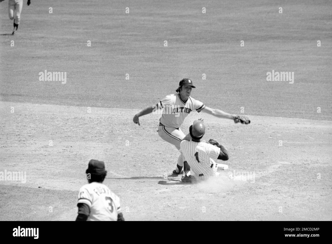 New York Mets Leo Foster (1) slides into Detroit Tigers shortstop Tom ...