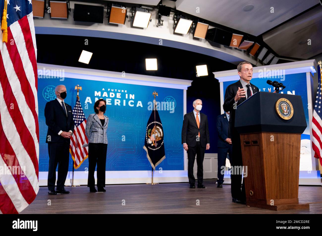 From left, President Joe Biden, Commerce Secretary Gina Raimondo, Sen ...
