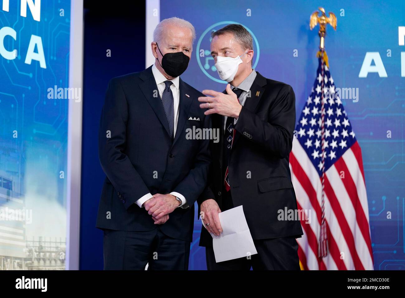 President Joe Biden speaks with Patrick Gelsinger, CEO of Intel, in the ...