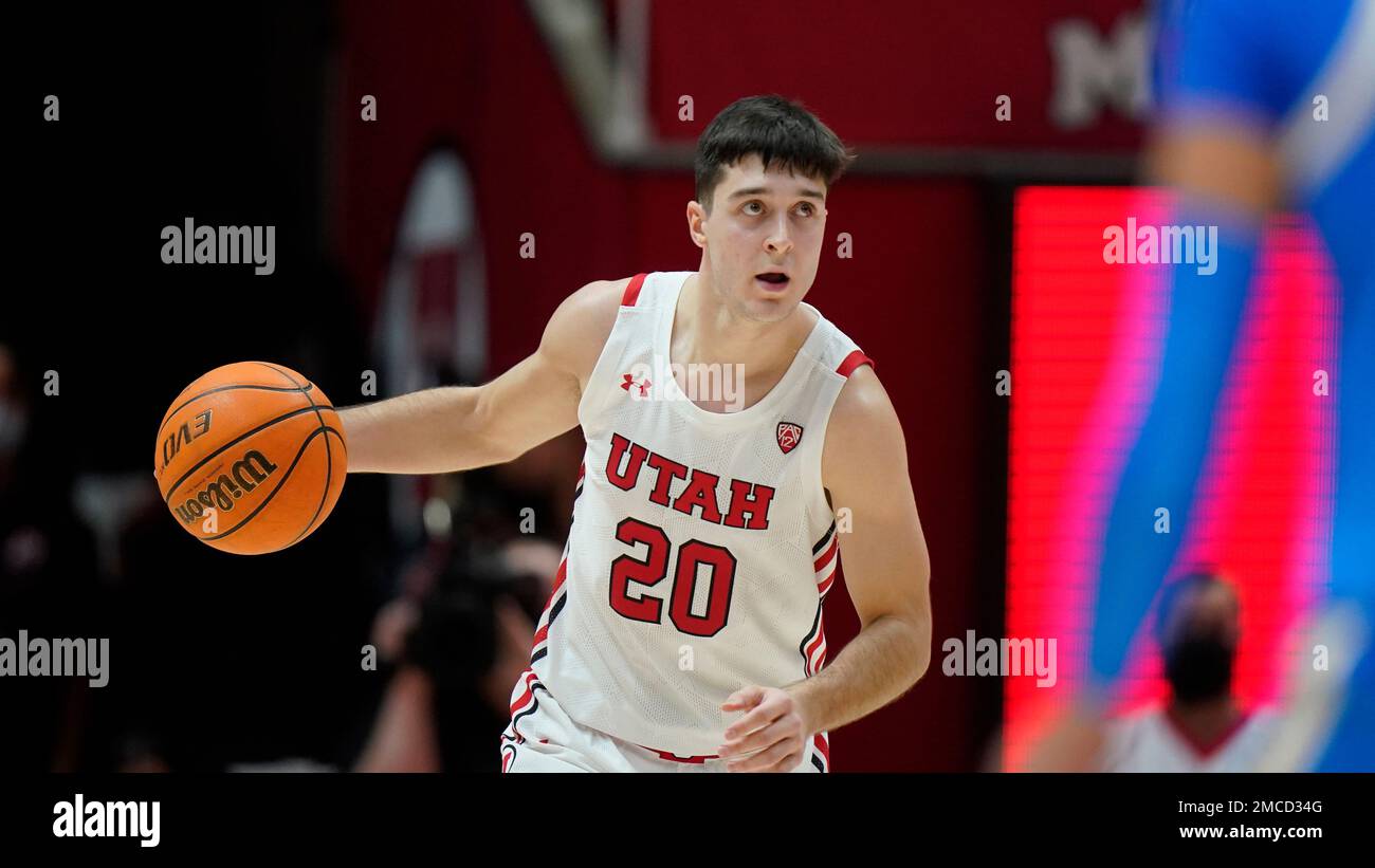 Utah guard Lazar Stefanovic (20) brings the ball up court in the second ...