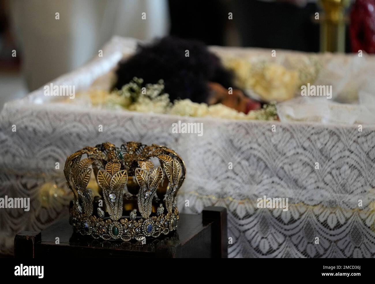 A crown sits on display next to the body of Brazilian samba singer Elza ...