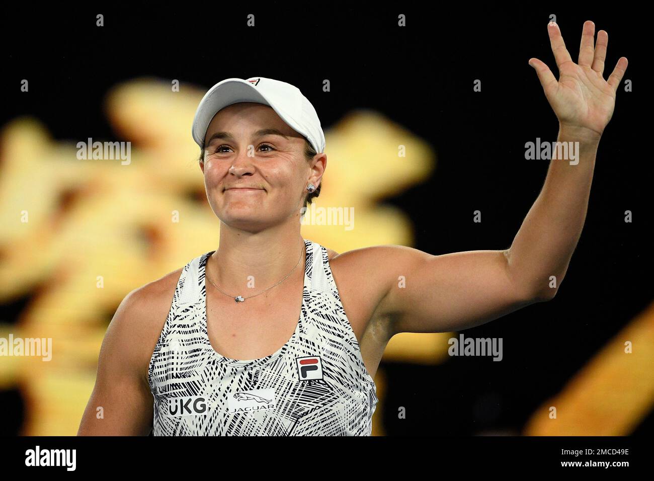 Ash Barty of Australia waves after defeating Camila Giorgi of Italy in their third round match ...