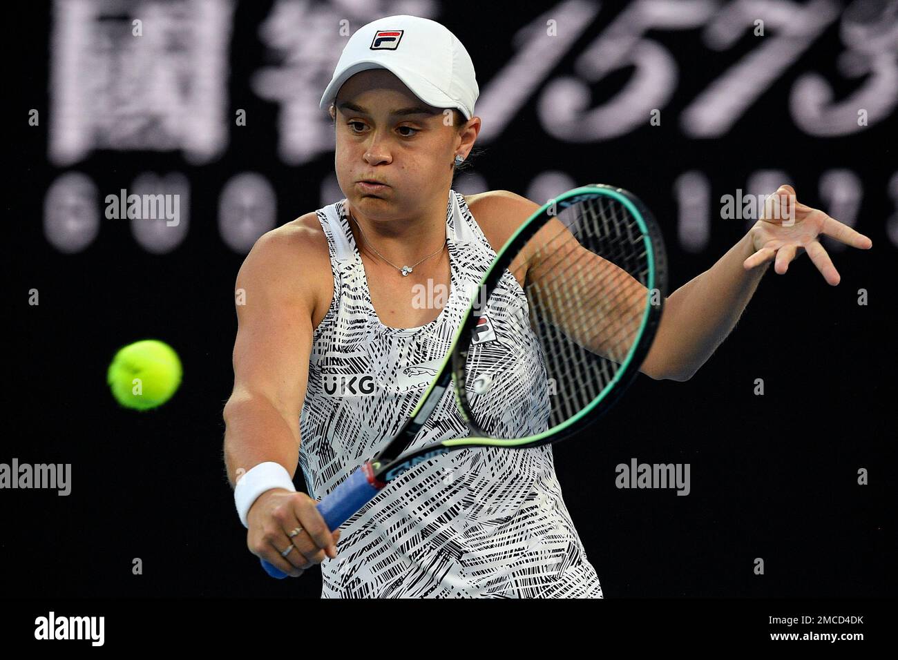 Ash Barty of Australia plays a backhand return to Camila Giorgi of Italy during their third ...