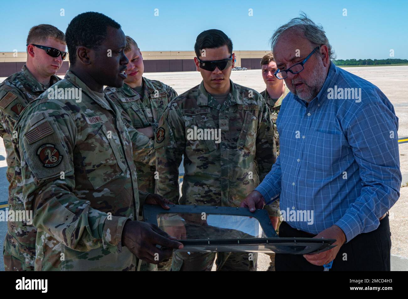 Airmen assigned to the 6th Maintenance Squadron and a member of ...