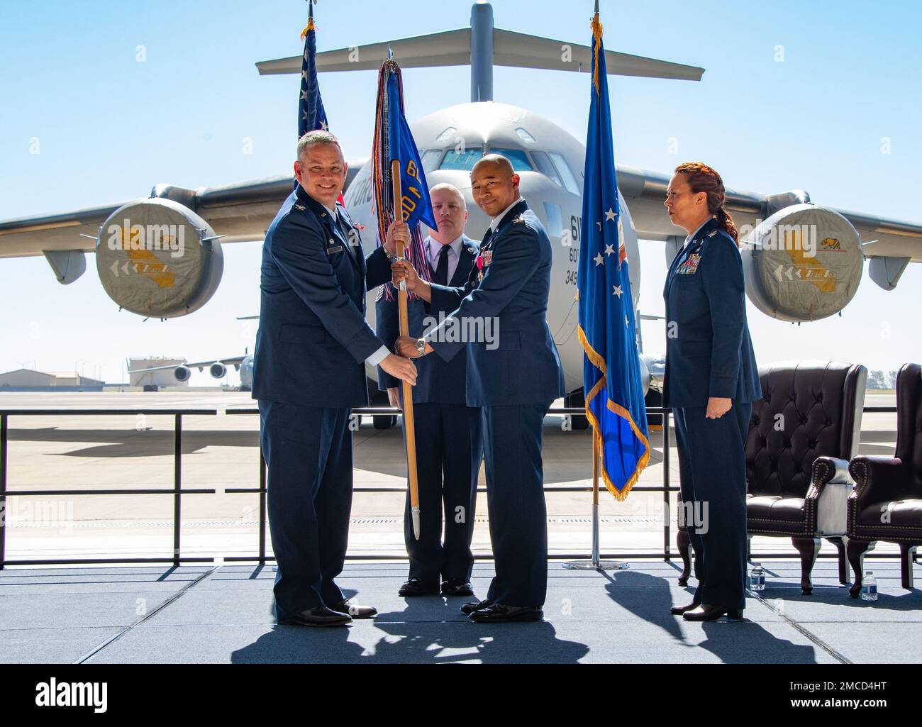 U.S. Air Force Col. Corey Simmons, left, 60th Air Mobility Wing ...