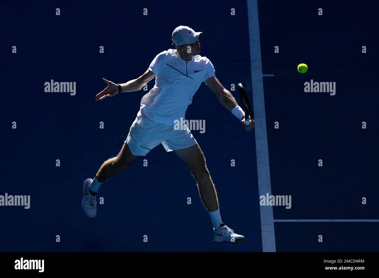Denis Shapovalov of Canada plays a backhand return to Reilly Opelka of ...