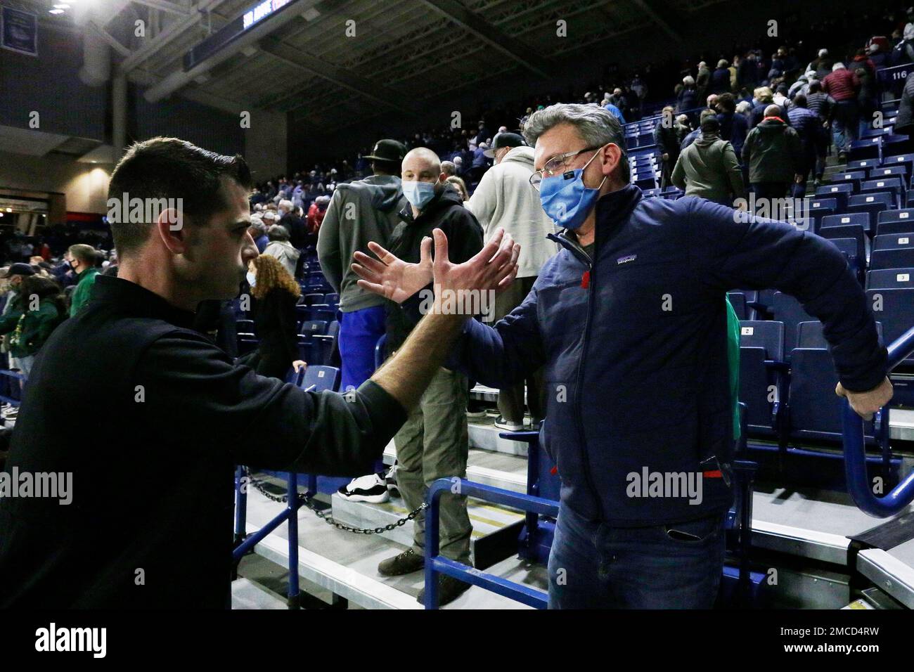 San Francisco coach Todd Golden, left, greets Washington State and ...