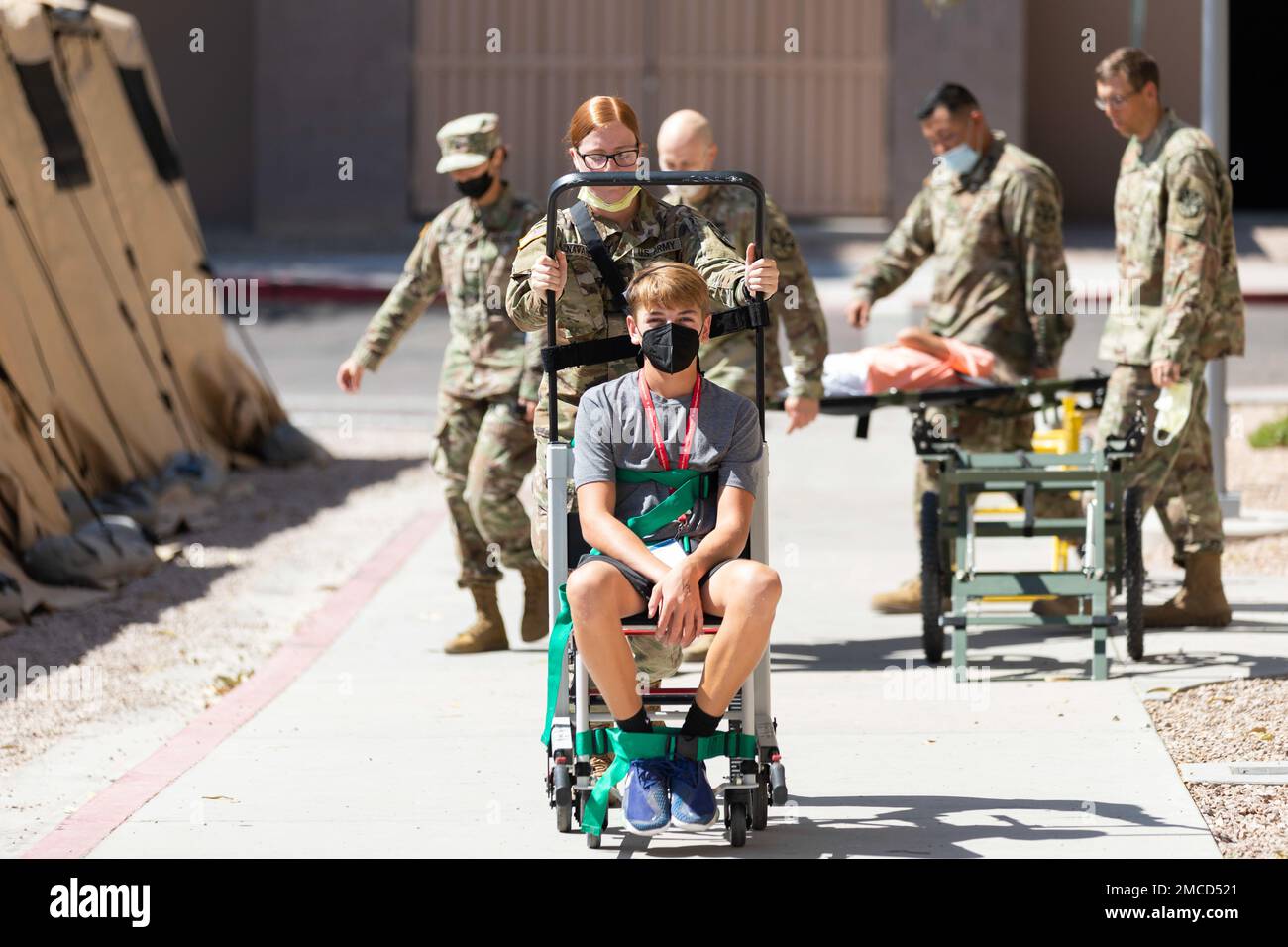 Soldiers with the Arizona Army National Guard Medical Detachment carry ...
