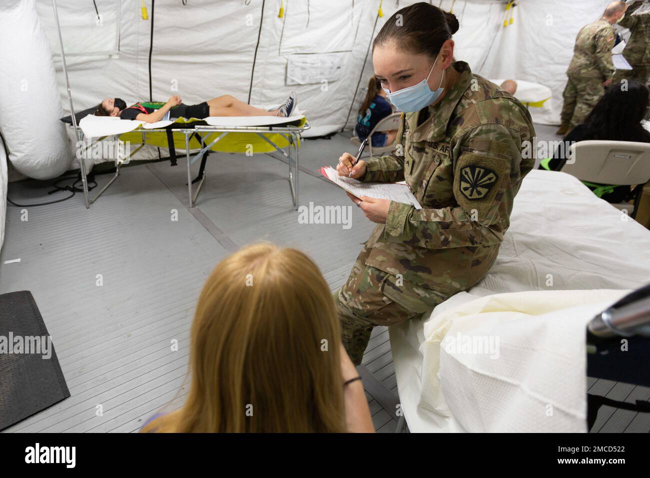 Soldiers with the Arizona Army National Guard Medical Detachment take ...