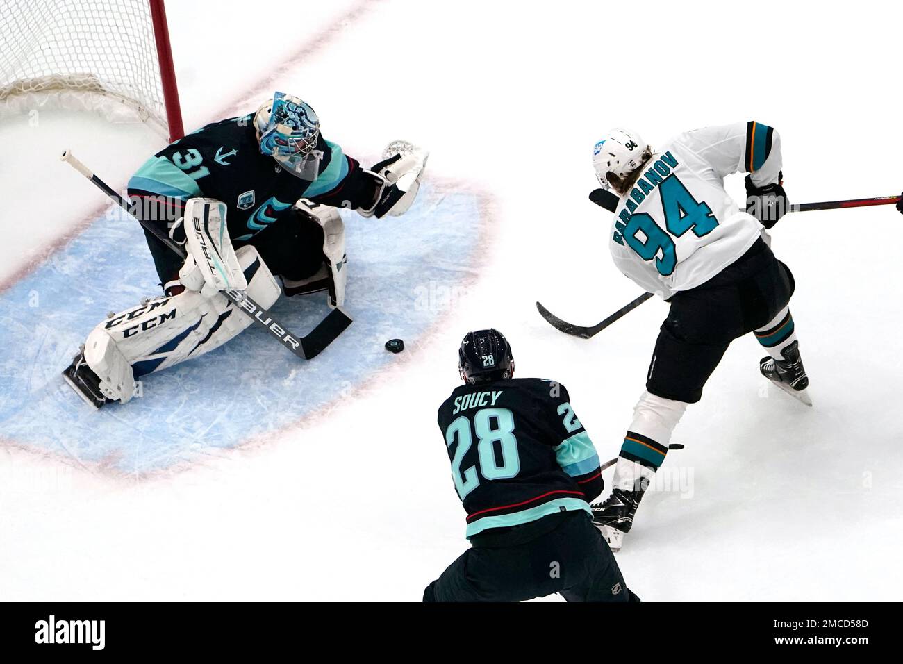 Seattle Kraken goaltender Philipp Grubauer (31) deflects a shot by San ...