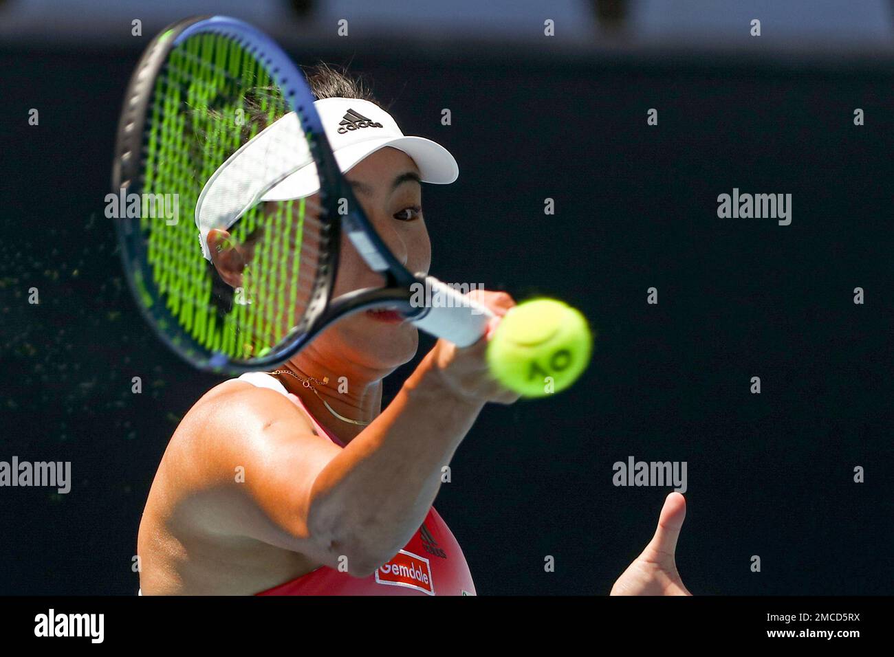 Wang Qiang of China plays a forehand return to Madison Keys of the U.S ...