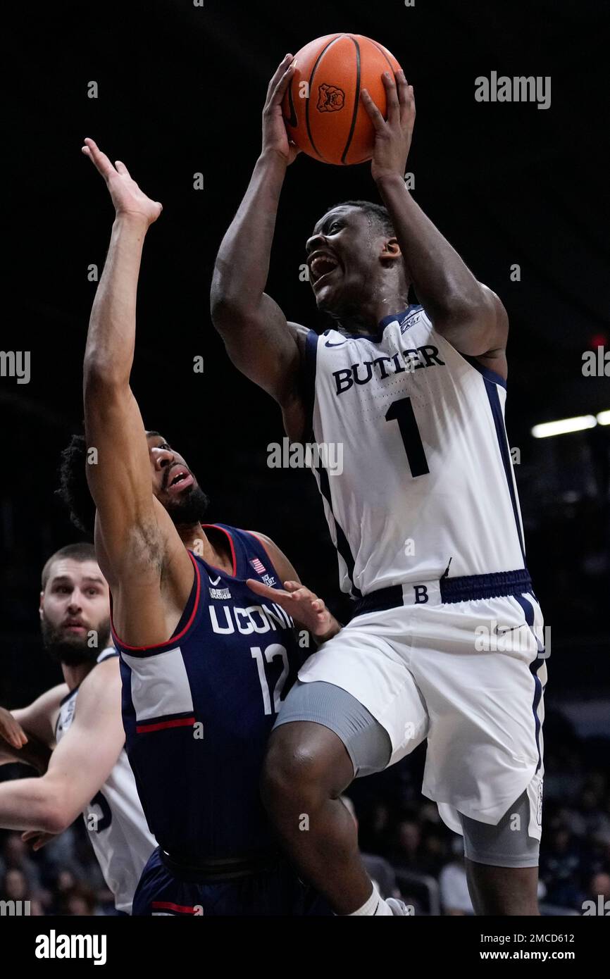 Butler guard Bo Hodges (1) shoots over Connecticut forward Tyler Polley ...