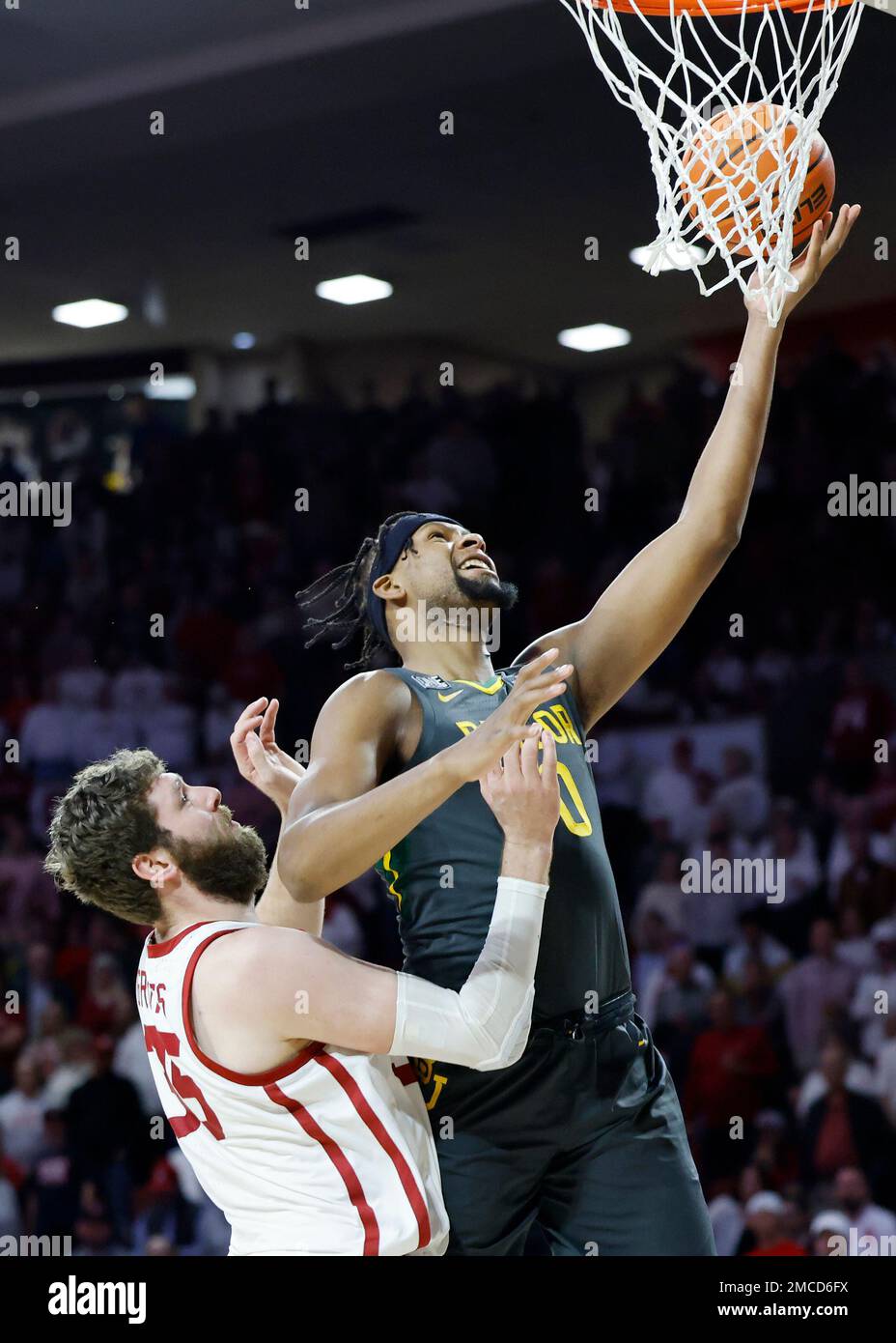 Baylor forward Flo Thamba, right, shoots against Oklahoma forward ...