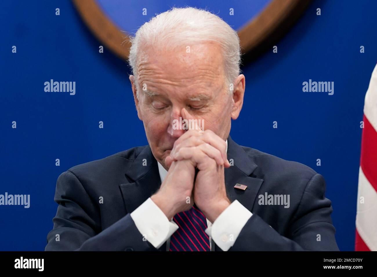 President Joe Biden listens during a meeting with the President's ...