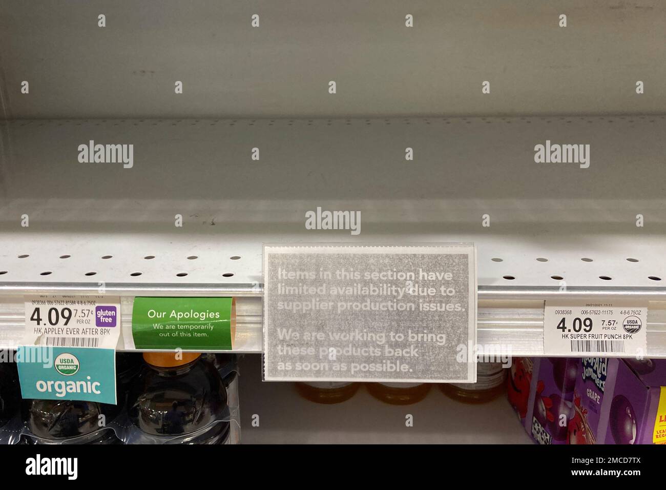 A sign attached to a store shelf alerts shoppers of the limited ...
