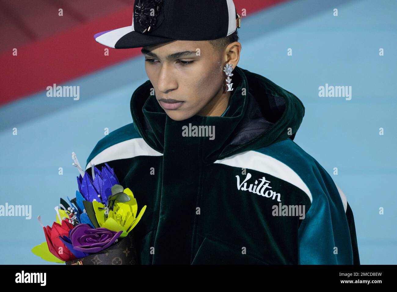 A model wears a creation for the Louis Vuitton fall-winter 22/23 men's ...