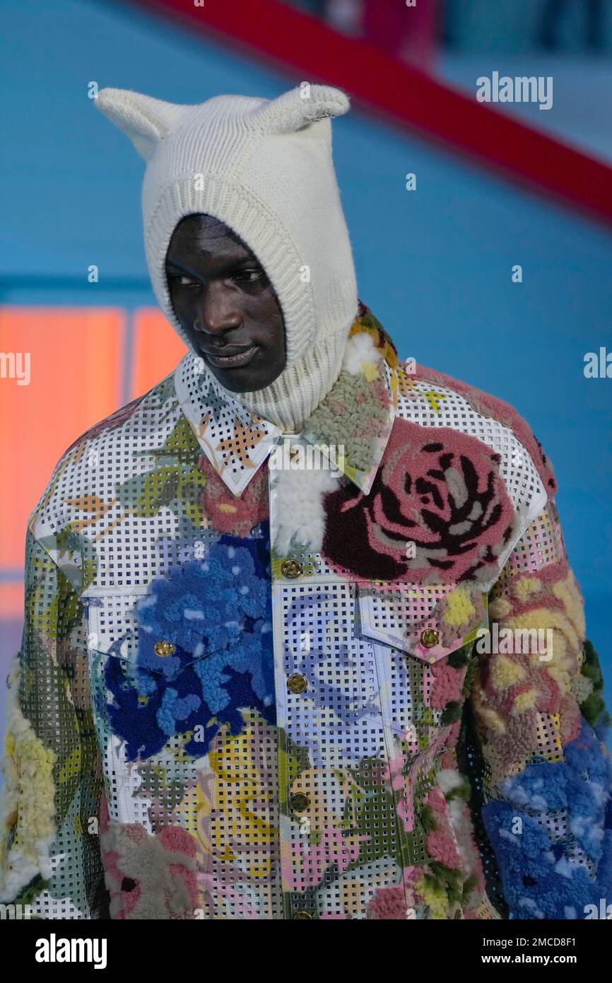 A model wears a creation for the Louis Vuitton fall-winter 22/23 men's ...
