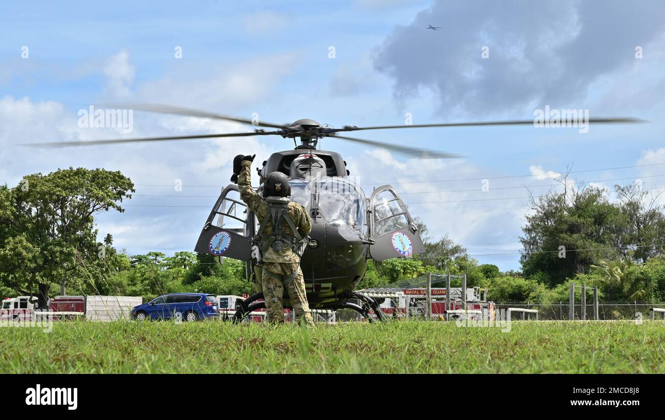 U.S. Army Sgt. Keoni Wong, a flight paramedic assigned to Detachment 2 ...