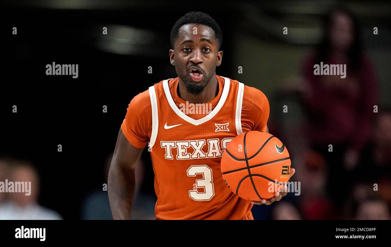 Texas guard Courtney Ramey drives up court during an NCAA college ...