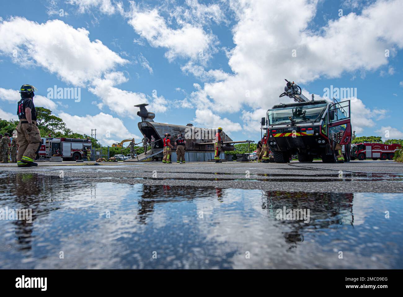 18th Civil Engineer Squadron firefighters prepare their fire engine for ...