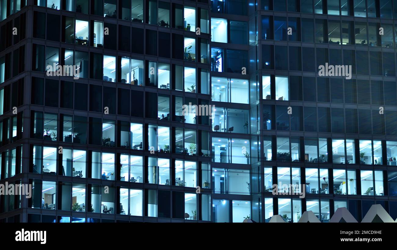 Modern office building in city at the night. View on illuminated ...