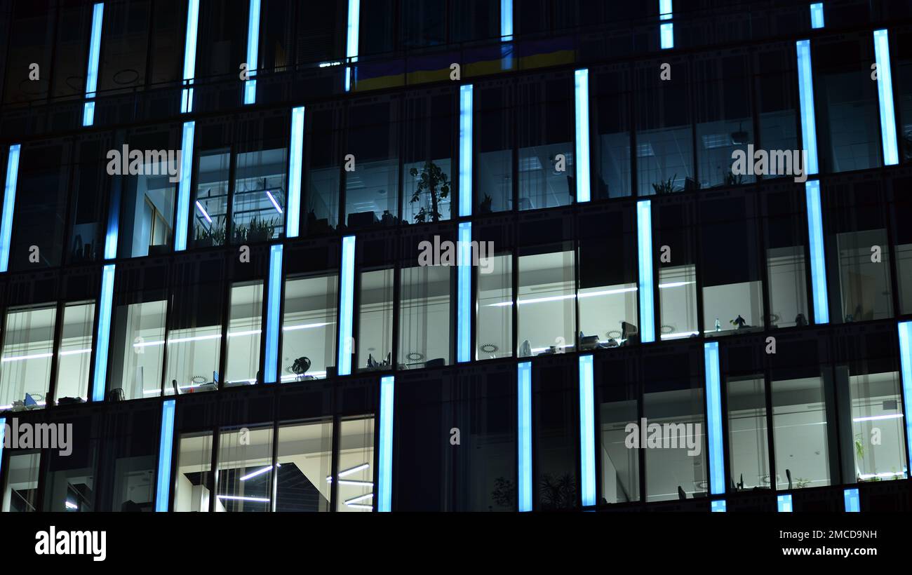 Modern office building in city at the night. View on illuminated ...