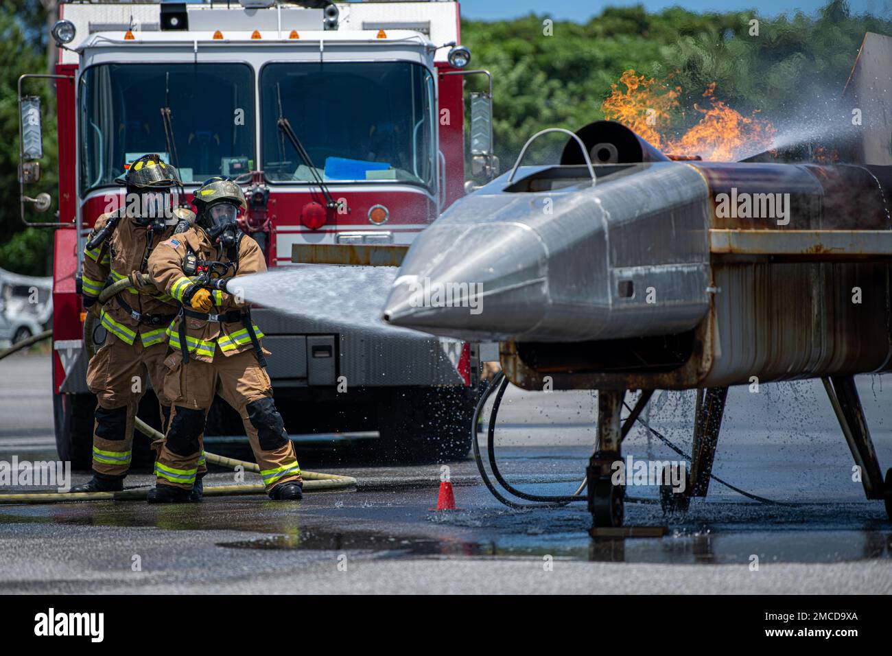 Senior Airman John Bruss, left, and Brian Arime, right, 18th Civil ...