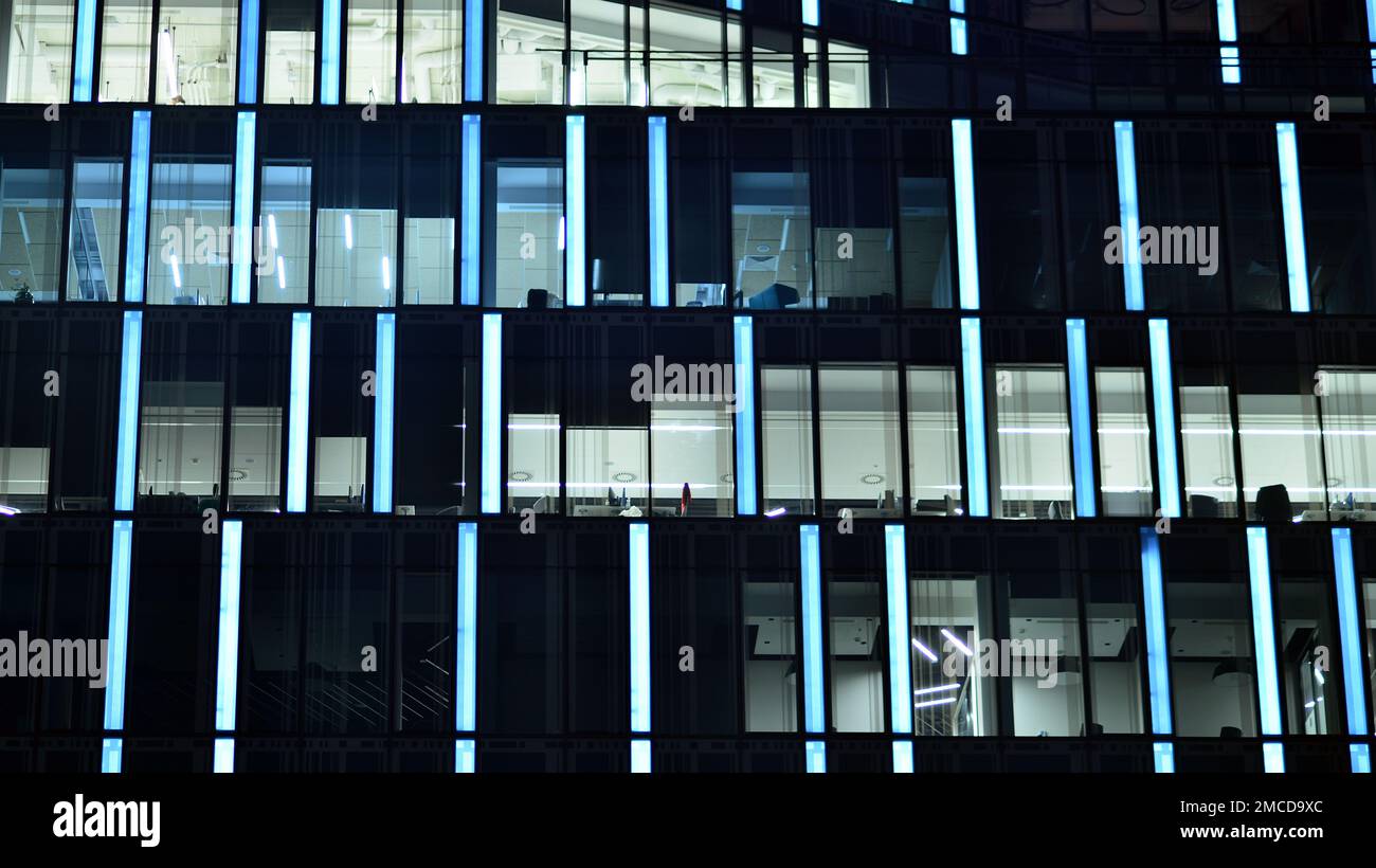 Modern office building in city at the night. View on illuminated ...
