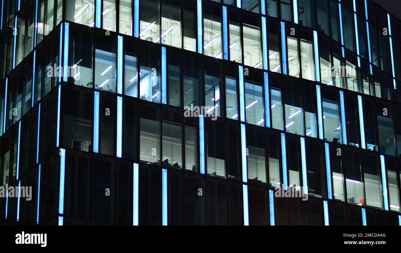 Modern office building in city at the night. View on illuminated ...