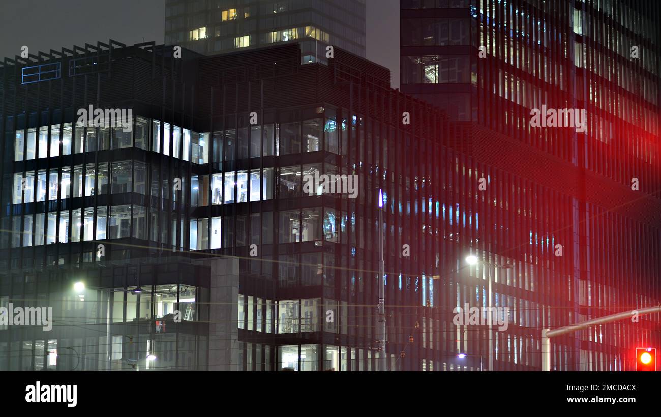 Modern office building in city at the night. View on illuminated ...