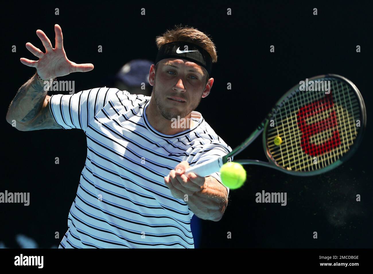 Alex Molcan of Slovakia plays a forehand return to Pablo Andujar of ...