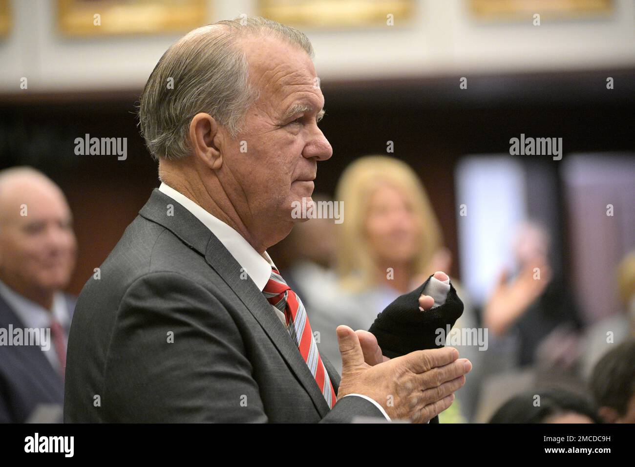 Florida Sen. Doug Broxson applauds during a legislative session ...