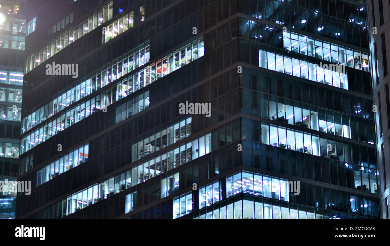Modern office building in city at the night. View on illuminated ...