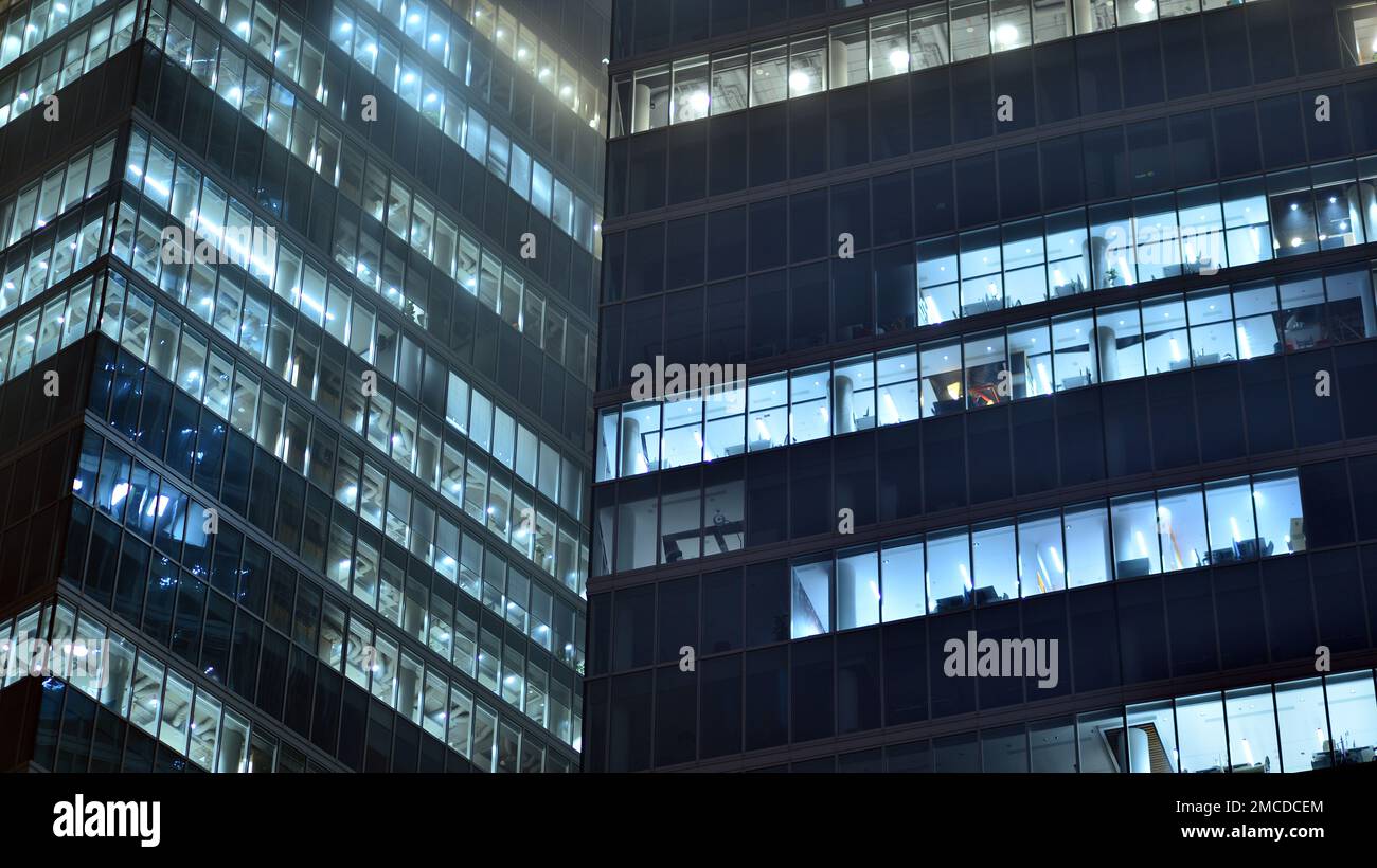 Modern office building in city at the night. View on illuminated ...