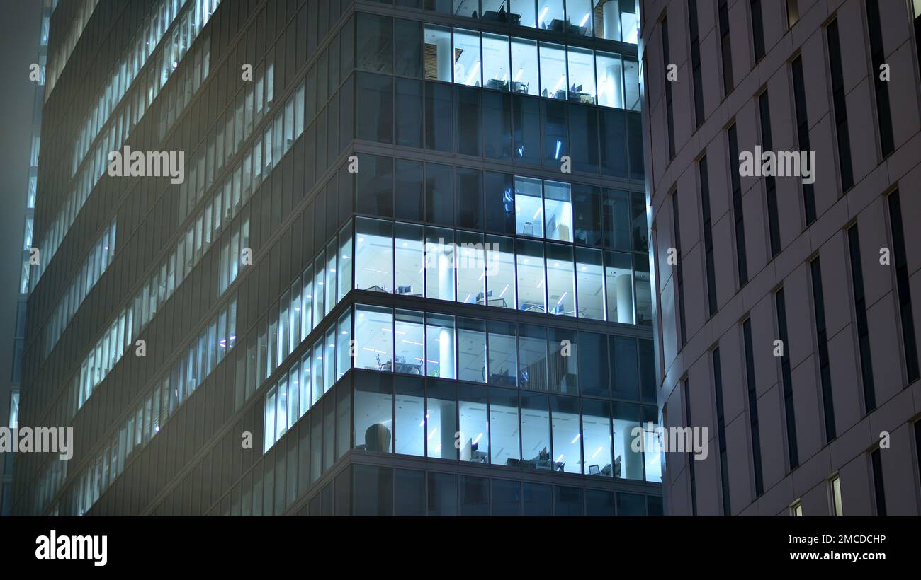 Modern office building in city at the night. View on illuminated ...